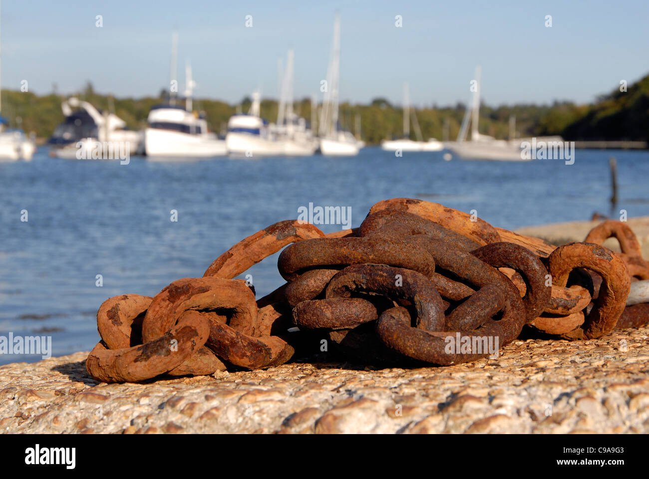 Rusty chain on a quayside by the Beaulieu River, Hampshire, UK Stock ...