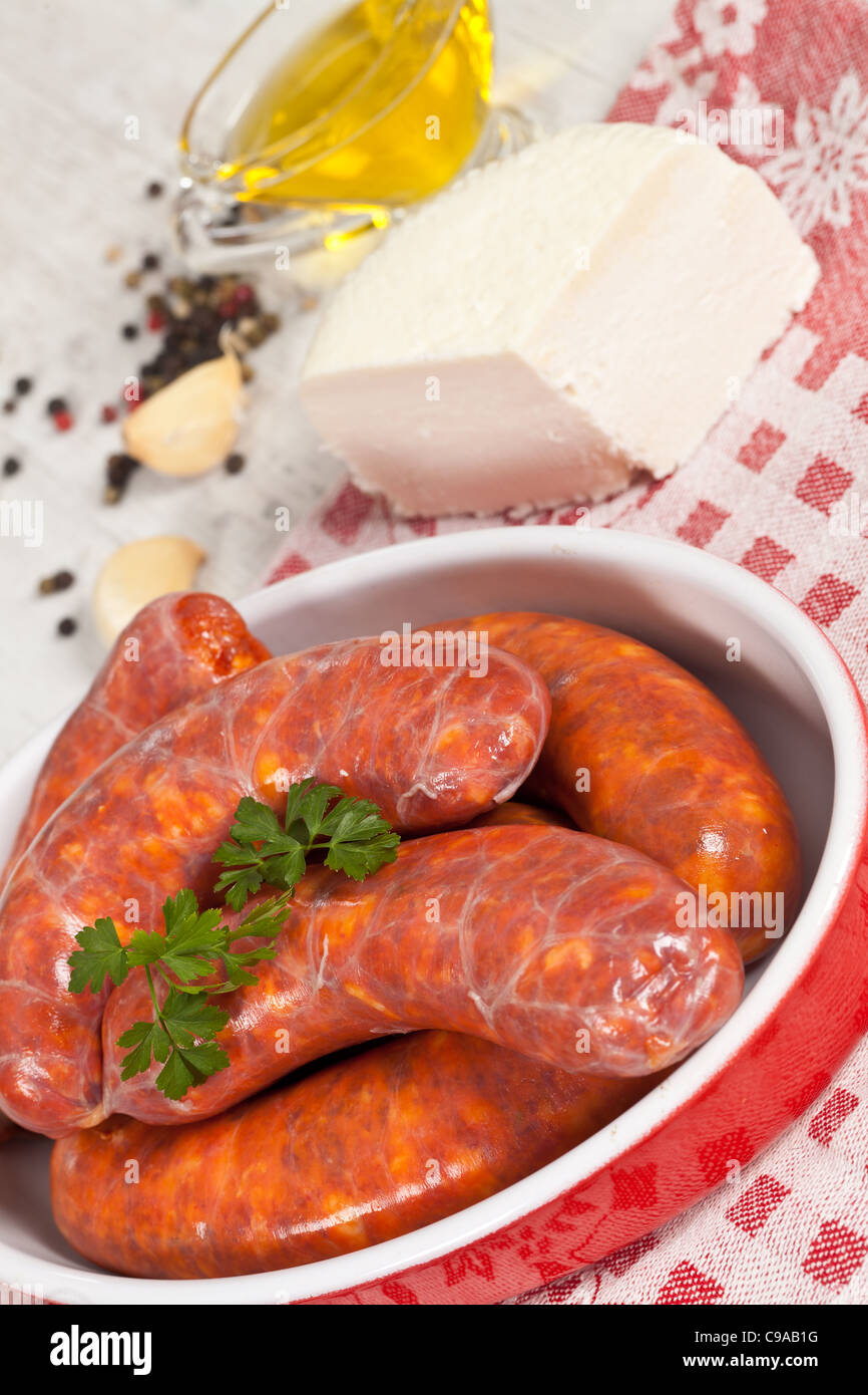 Fresh raw chili sausage typical from south italy Stock Photo - Alamy