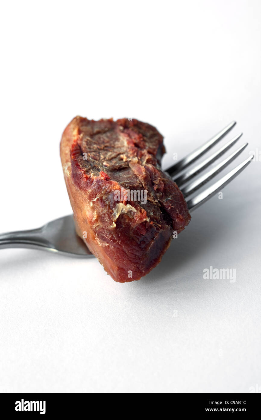Donkey Meat on plate with fork - An example of the strange or weird ...