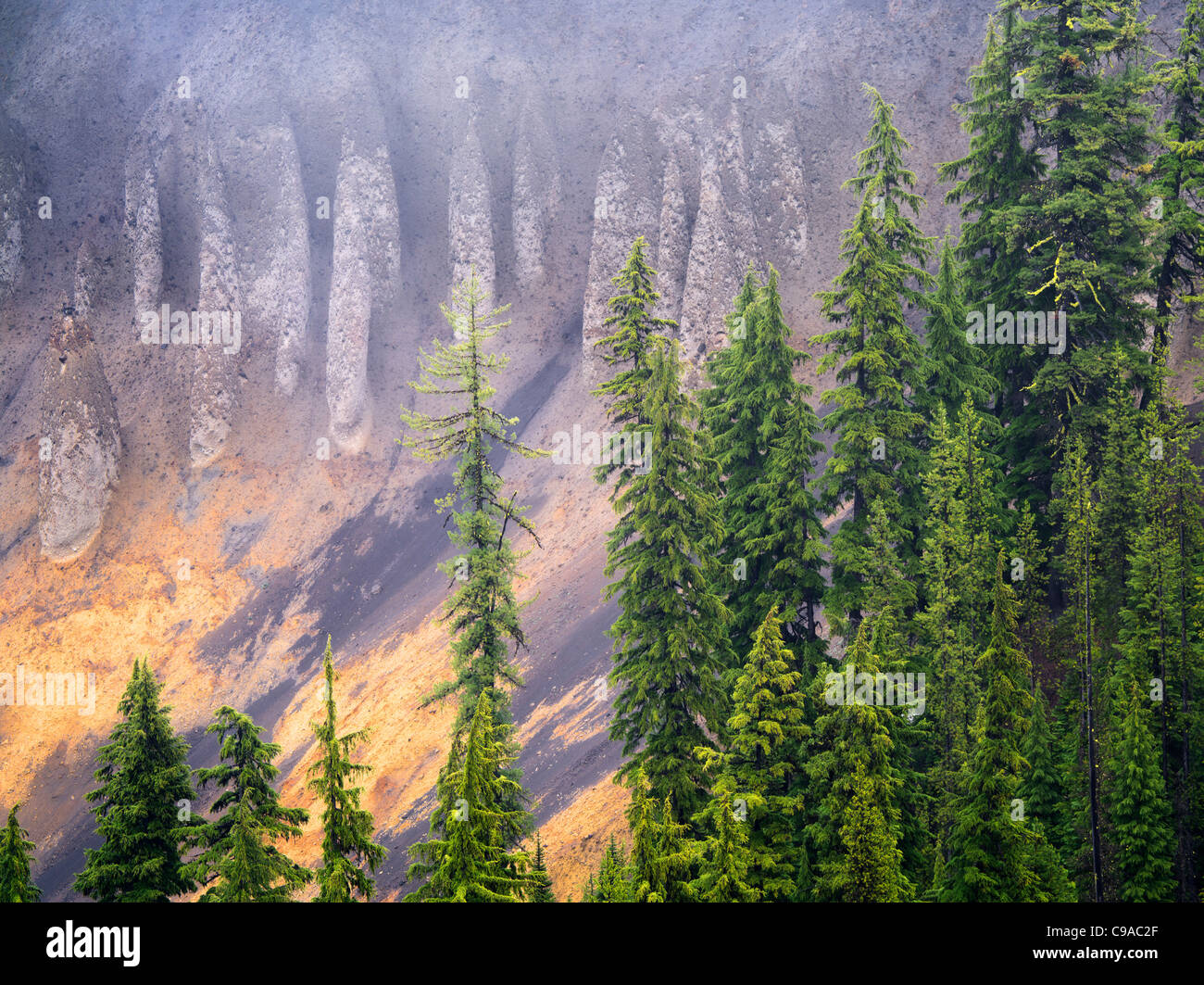 The Pinnacles with low clouds and rain. Crater Lake National Park ...