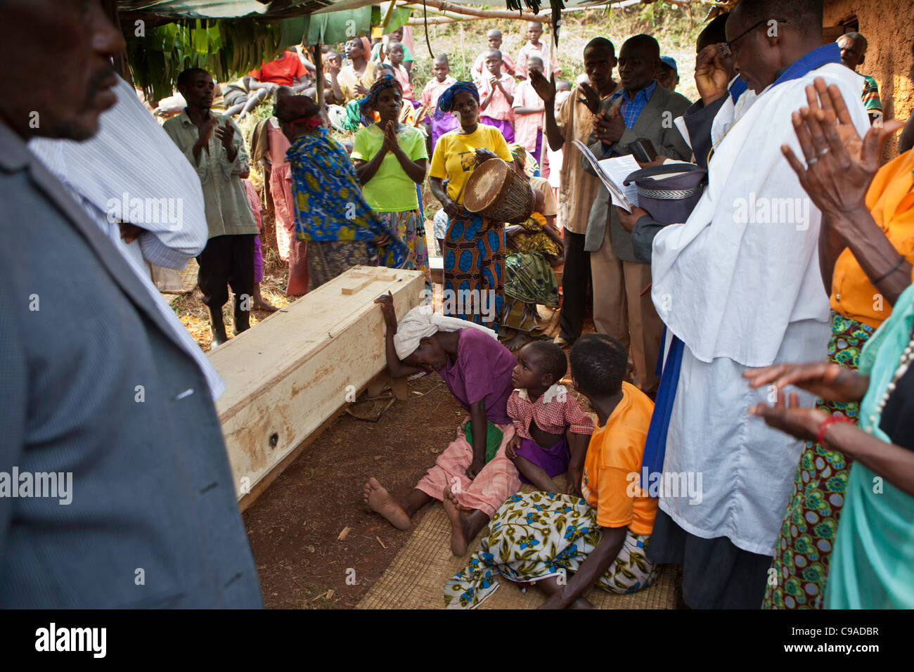 Locals from the Batwa tribe community gather for the funeral of Matale ...