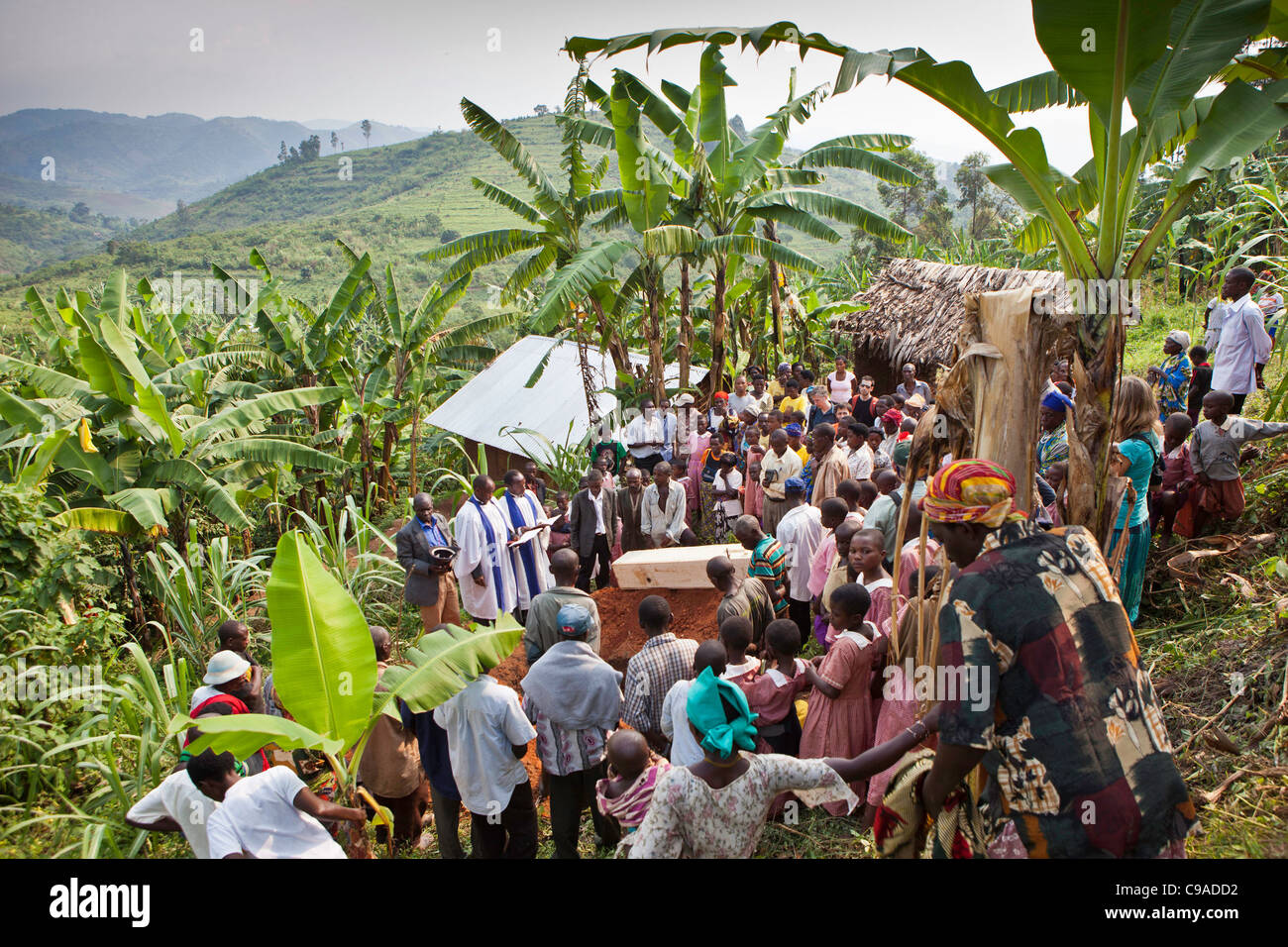 Locals from the Batwa tribe community gather for the funeral of Matale ...