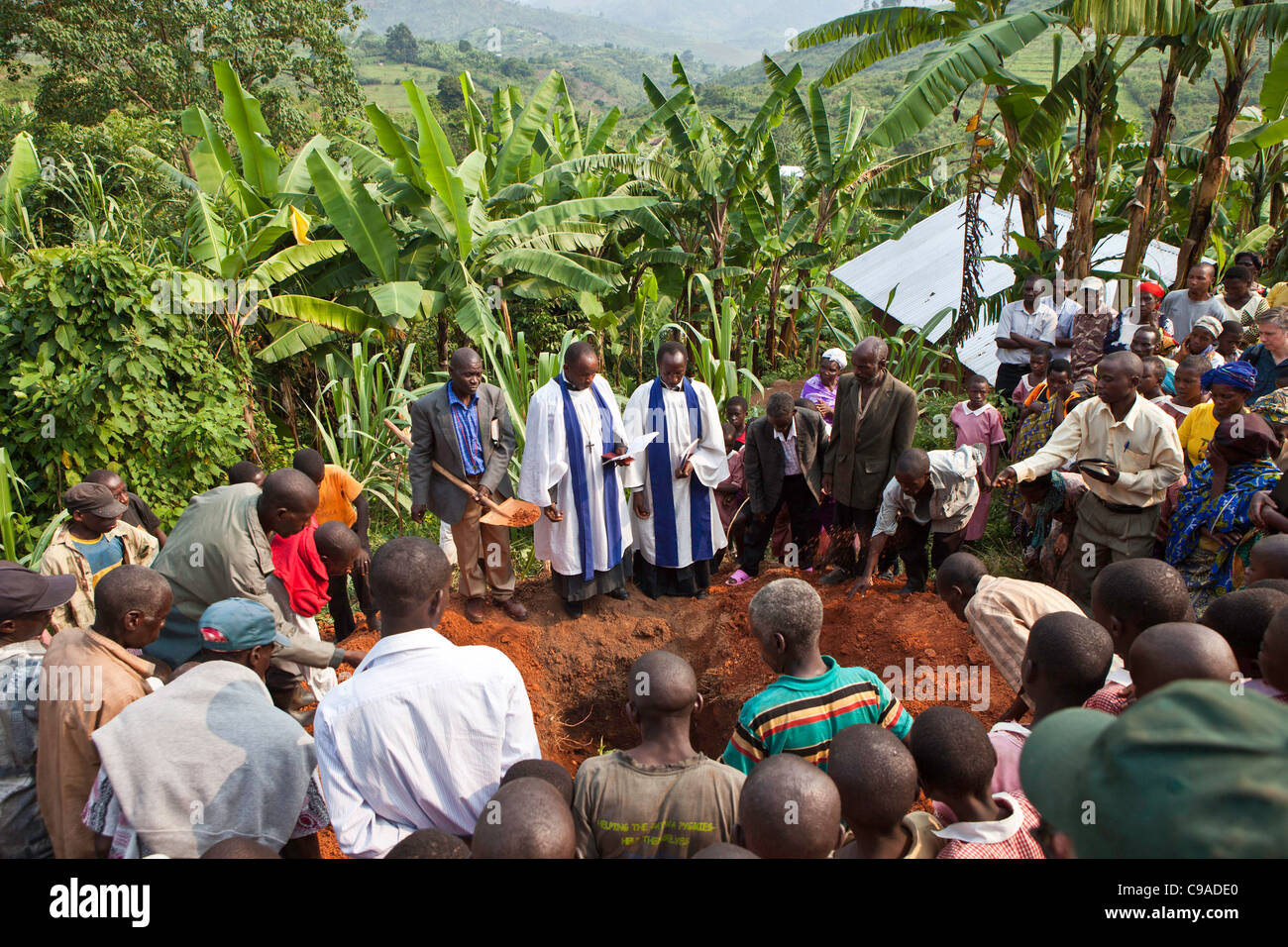 Locals from the Batwa tribe community gather for the funeral of Matale ...