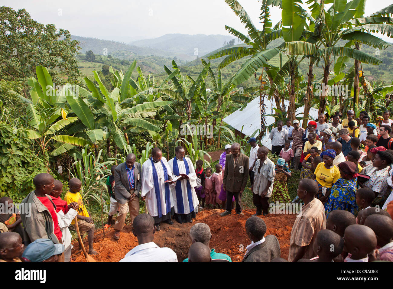 Locals from the Batwa tribe community gather for the funeral of Matale ...