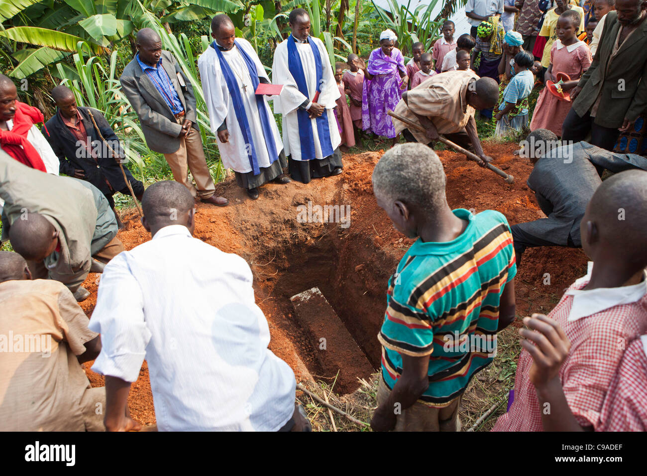 Locals from the Batwa tribe community gather for the funeral of Matale ...