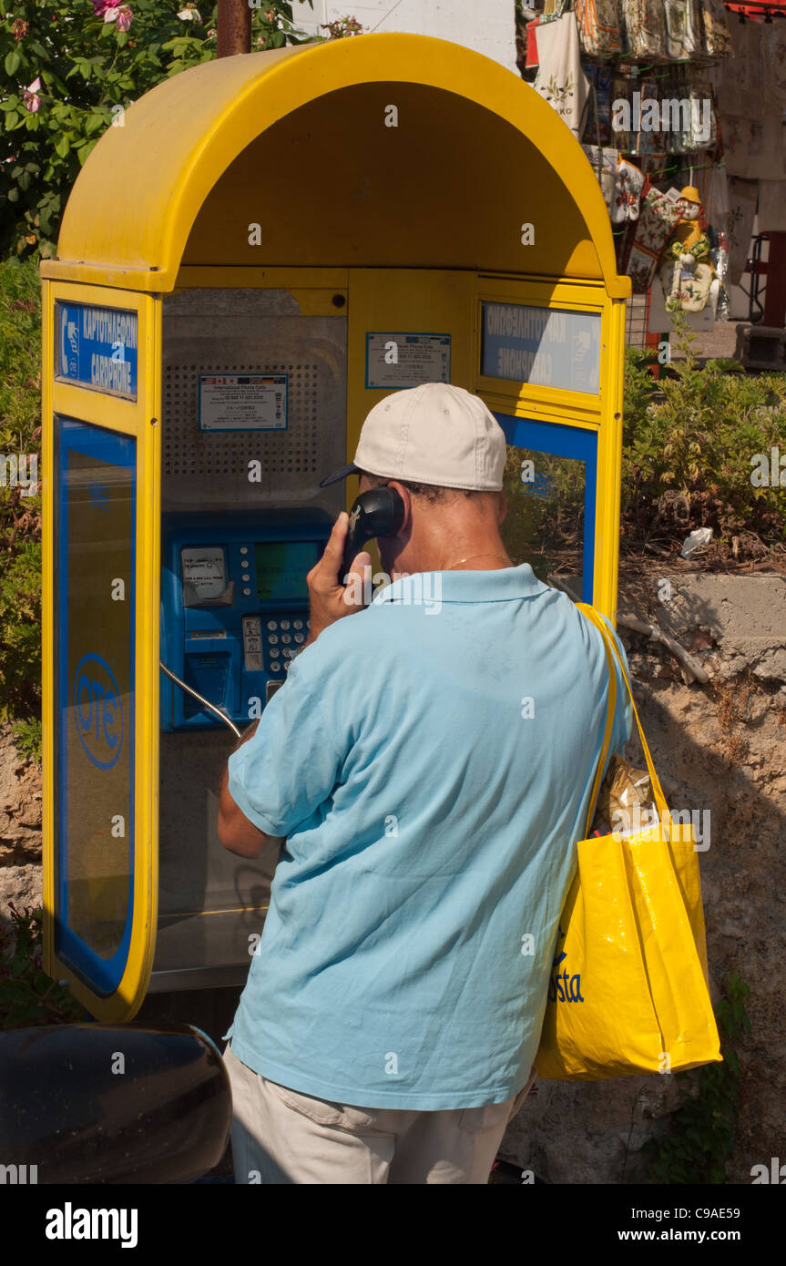 Yellow telephone box hi-res stock photography and images - Alamy