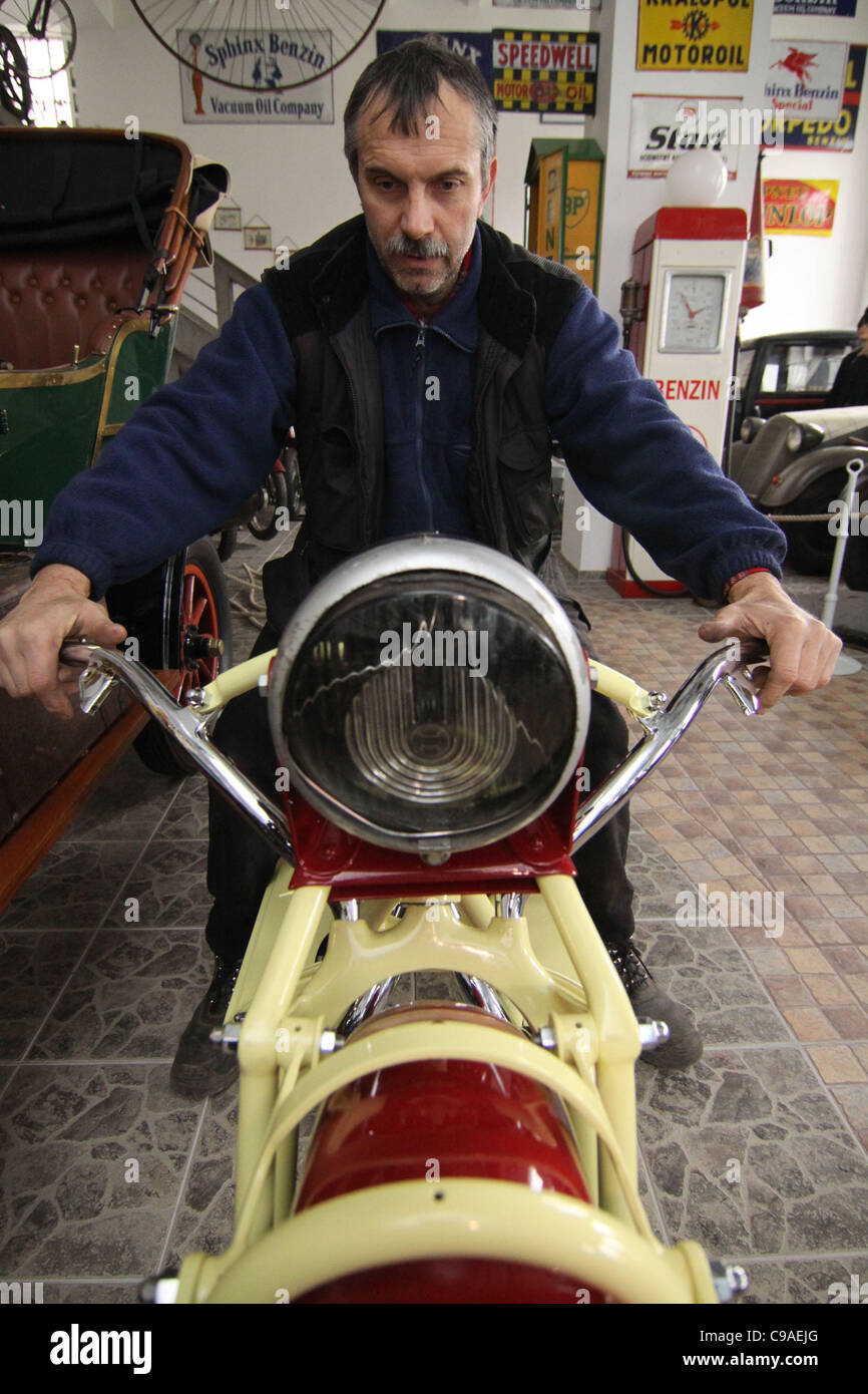 Jan Drozd pictured with nearly reconstructed motorcycle Cechie or ...