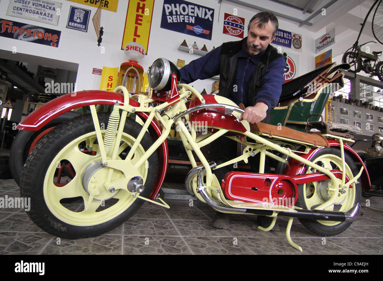 Jan Drozd pictured with nearly reconstructed motorcycle Cechie or ...