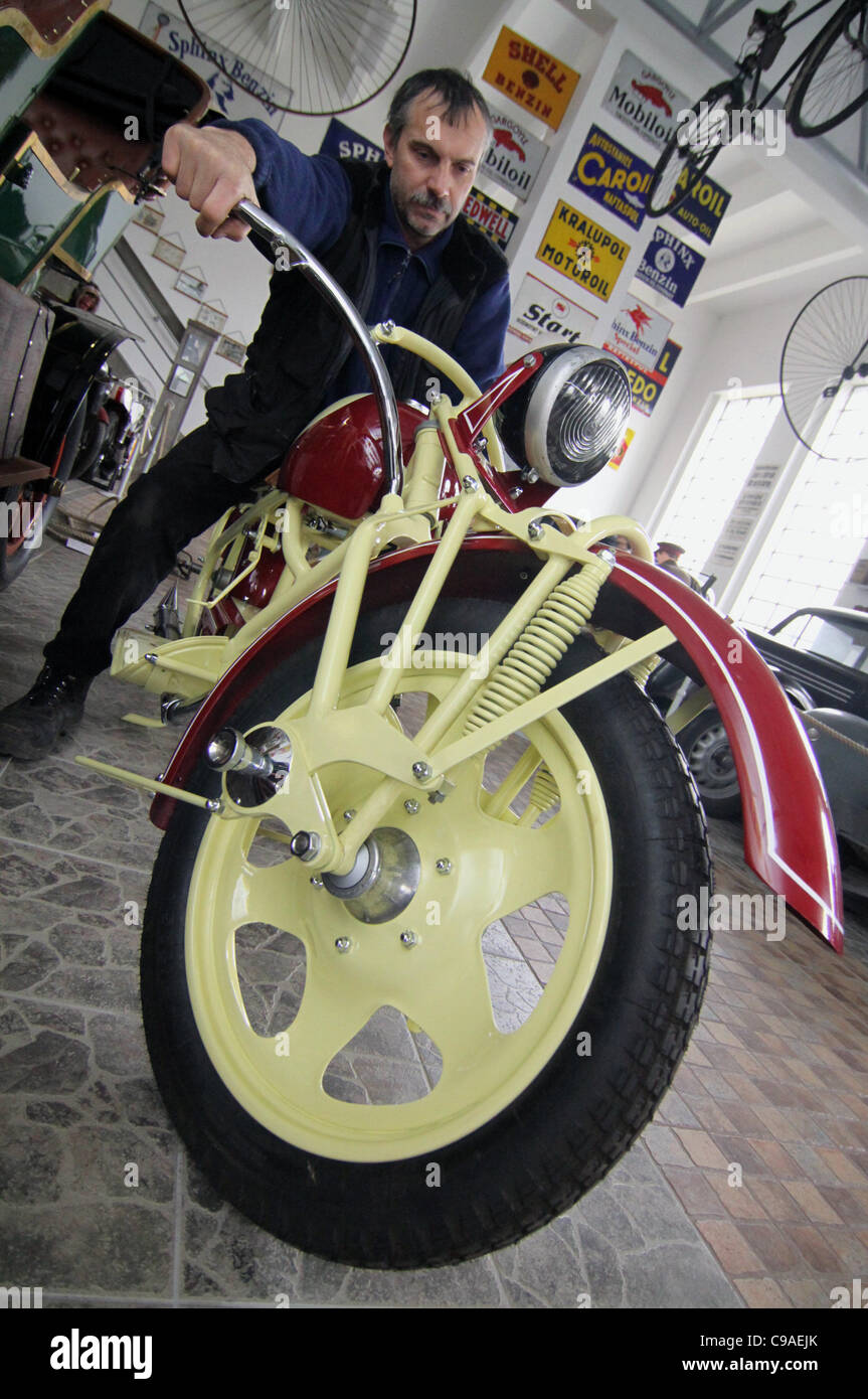 Jan Drozd pictured with nearly reconstructed motorcycle Cechie or ...