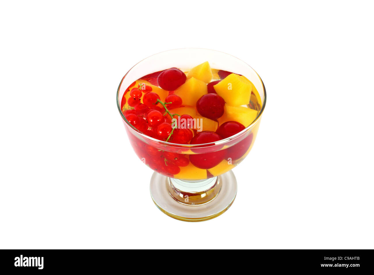 Tasty fruit compote isolated on white background Stock Photo - Alamy
