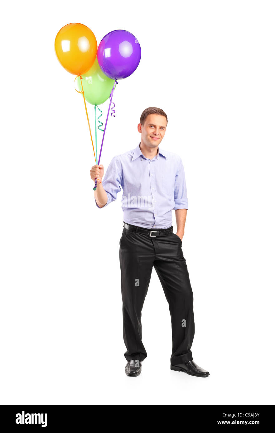Man holding balloons hi-res stock photography and images - Alamy