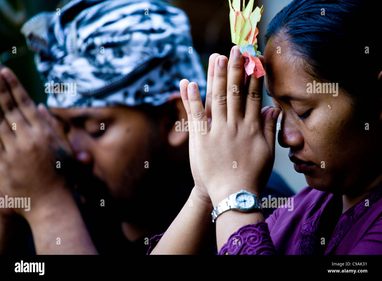 Local Balinese people blessing a newly built swimming pool in Ubud ...