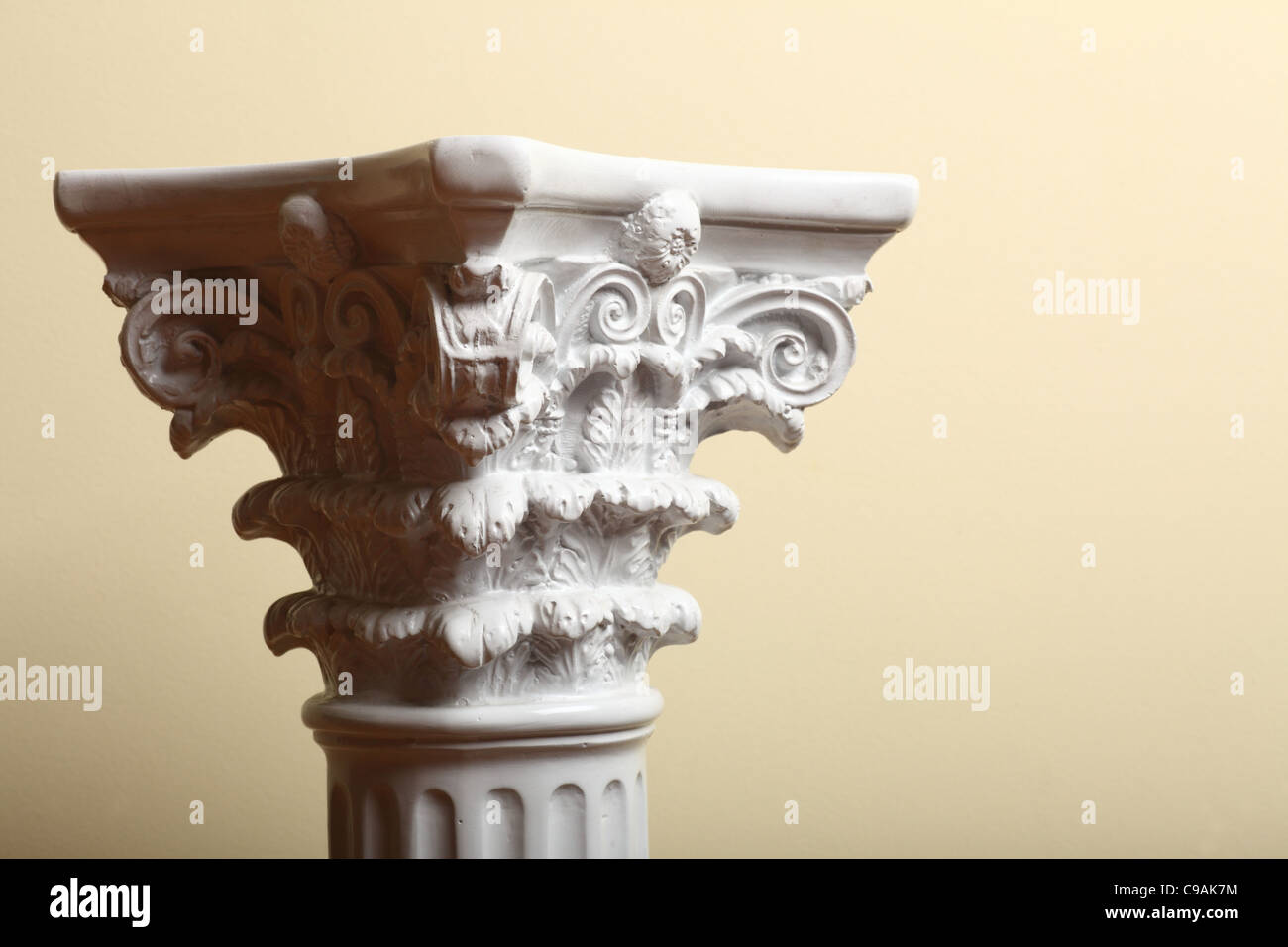 white column indoor on yellow background Stock Photo - Alamy