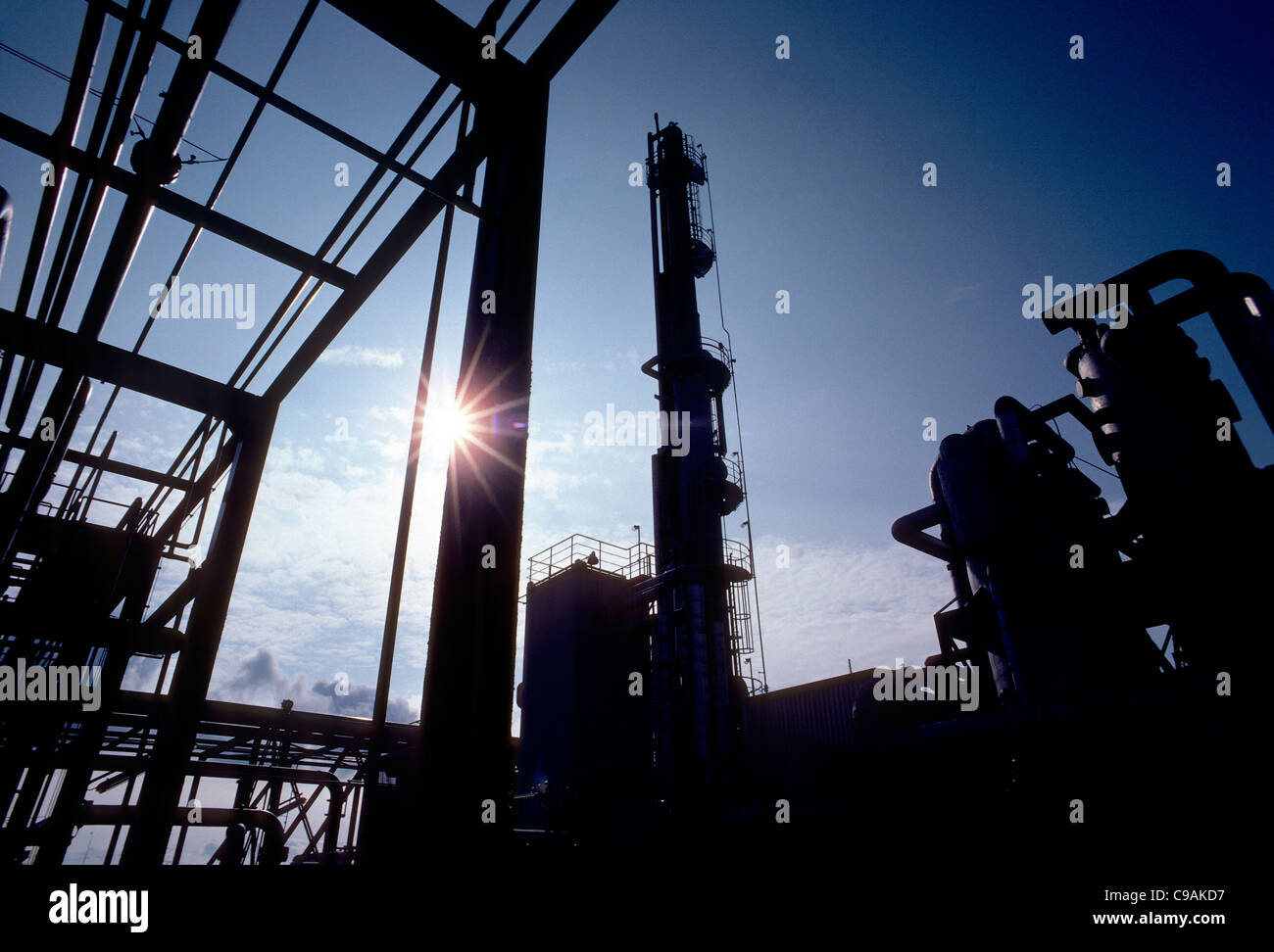 Graphic view of complex overhead pipes, oil refinery Stock Photo - Alamy