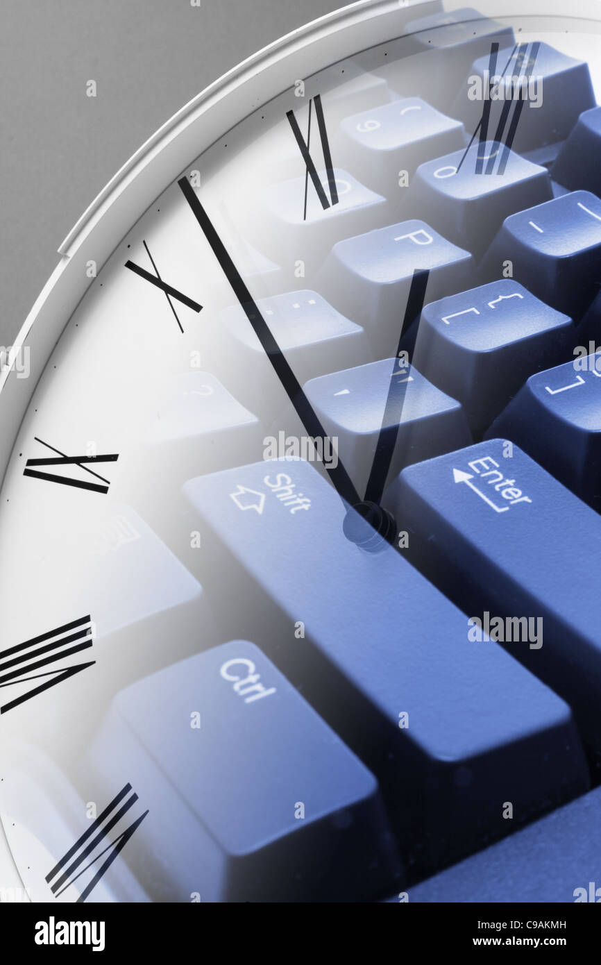 Clock and Computer Keyboard Stock Photo - Alamy