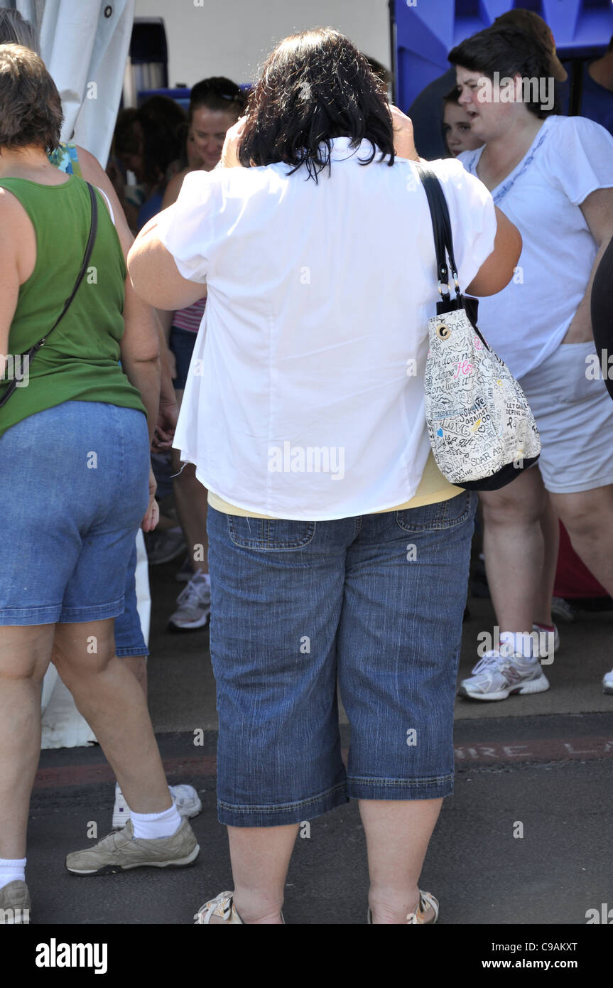 Fat woman walking rear view hi-res stock photography and images - Alamy