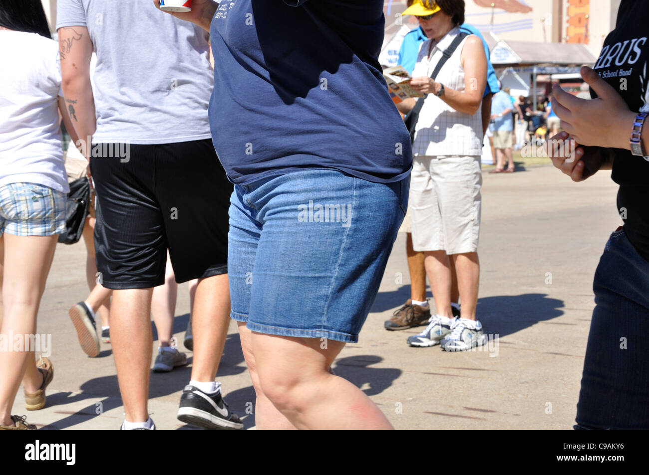 Fat woman obesity obese overweight walking side view hi-res stock ...