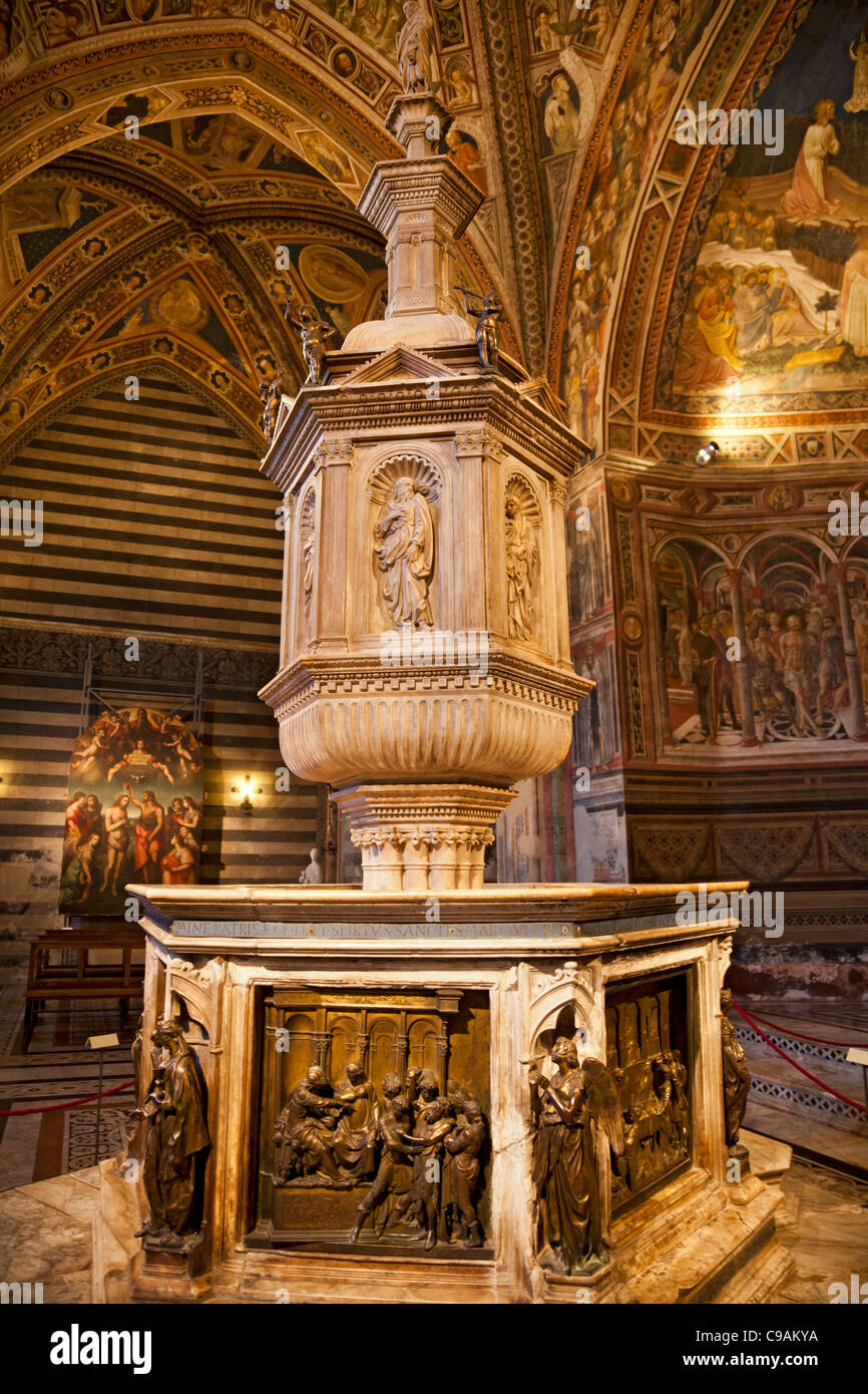 Font in Siena Baptistry, with marble tabernacle and statue by Jacopo ...