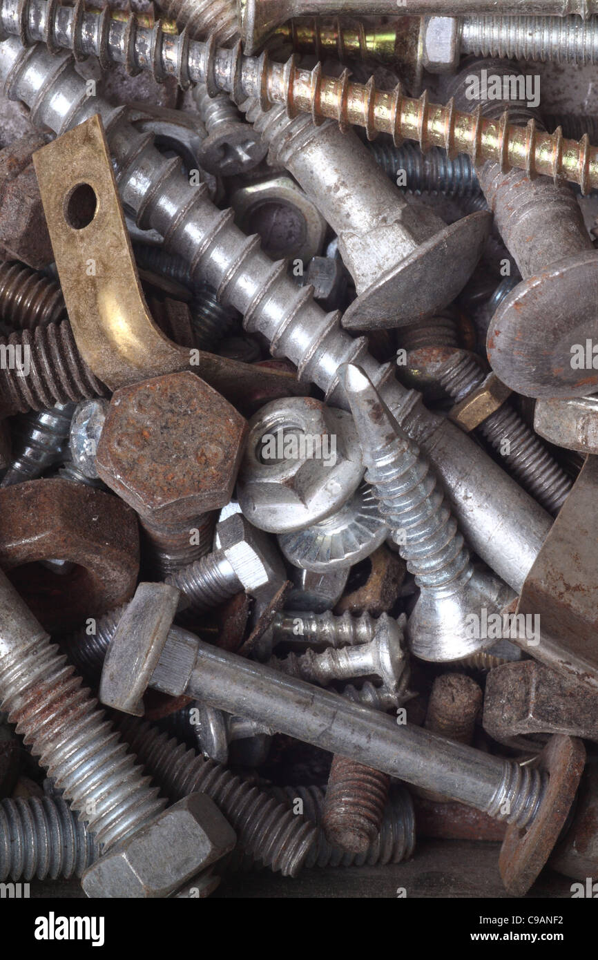 Industrial steel hardware bolts background Stock Photo - Alamy