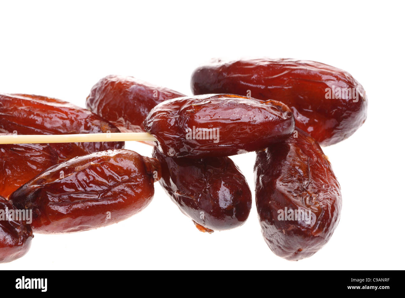 Dried date fruits isolated on white background Stock Photo - Alamy