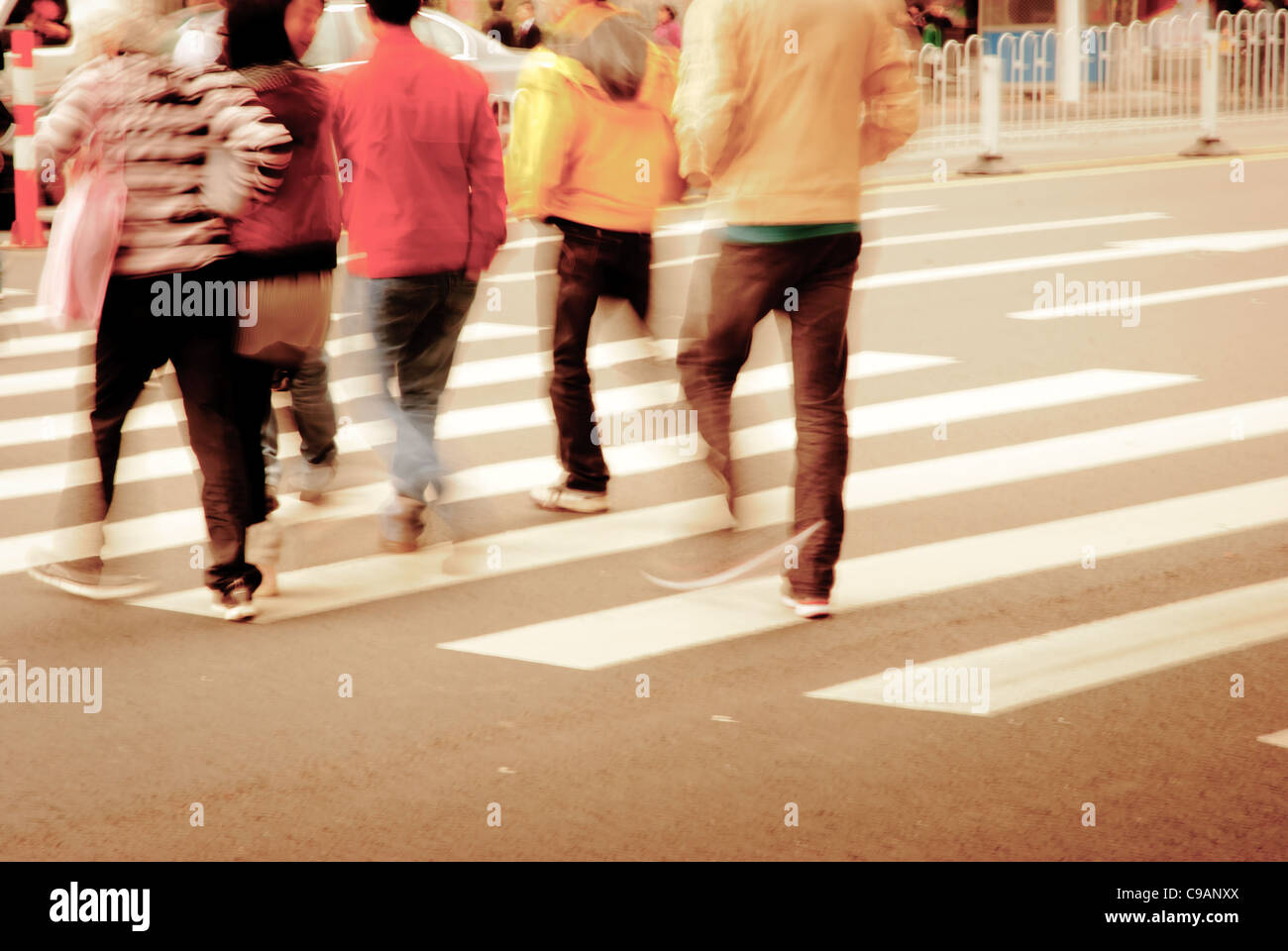Chinese worker on zebra crossing street Stock Photo - Alamy