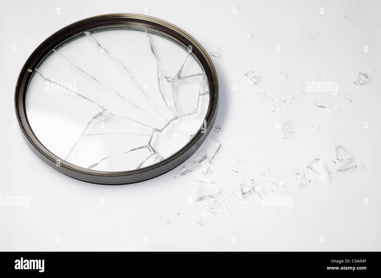 Broken DSLR camera lens isolated on white Stock Photo - Alamy