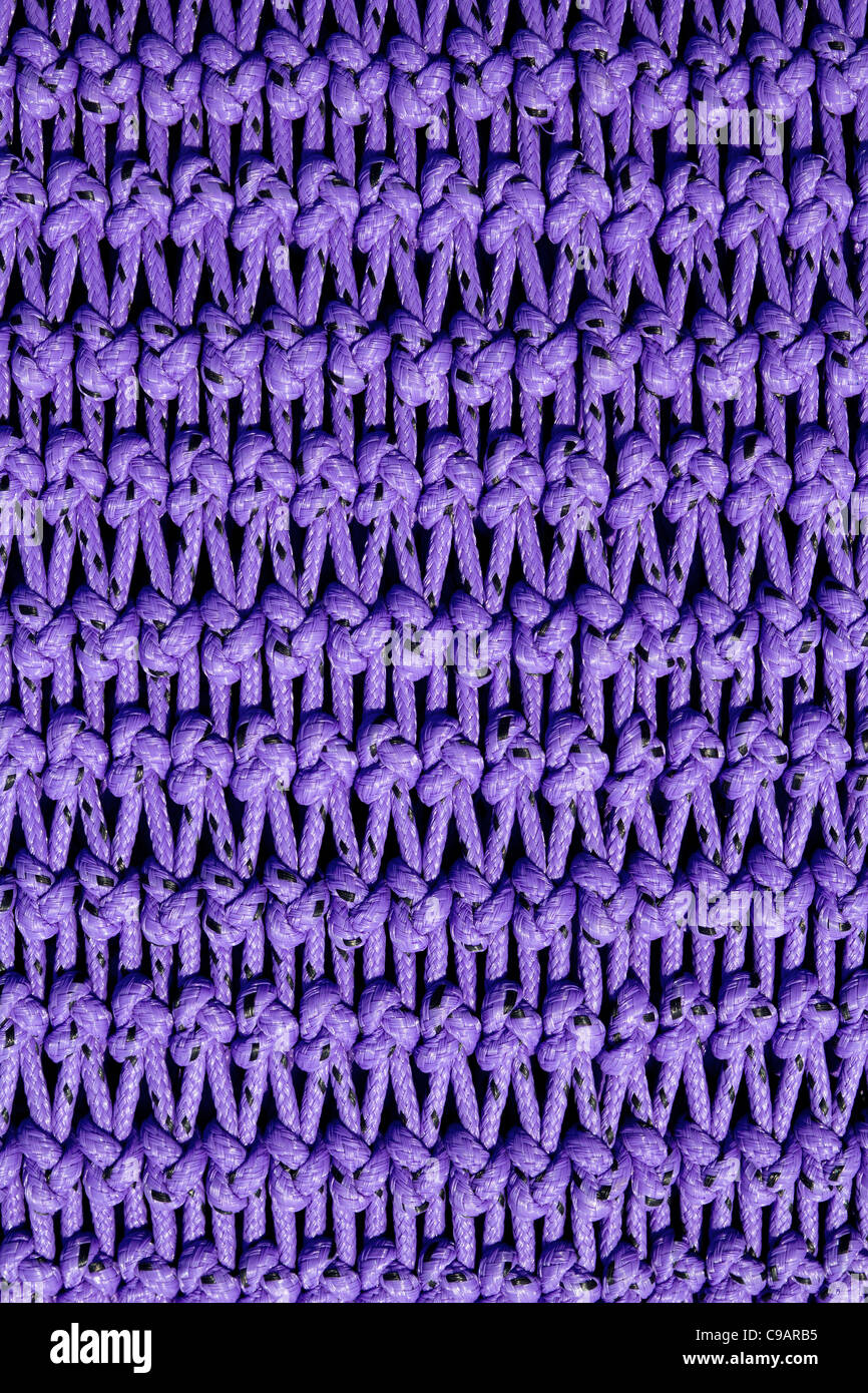 fishing trawler boat net purple texture with rope knots Stock Photo - Alamy