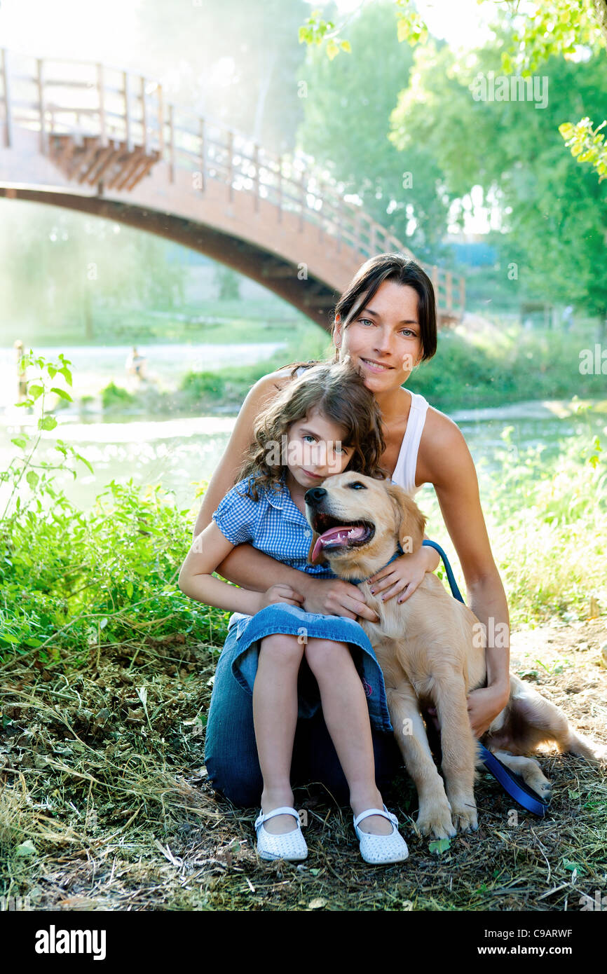 Mother daughter golden retriever dog hi-res stock photography and ...