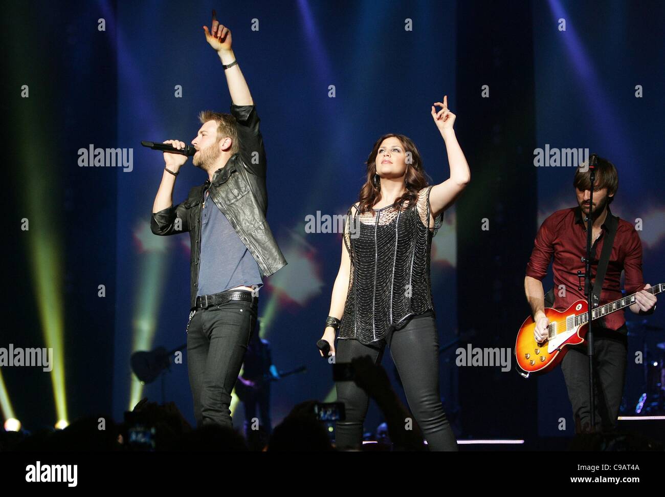 Charles Kelley, Hillary Scott, Dave Haywood of Lady Antebellum on stage ...
