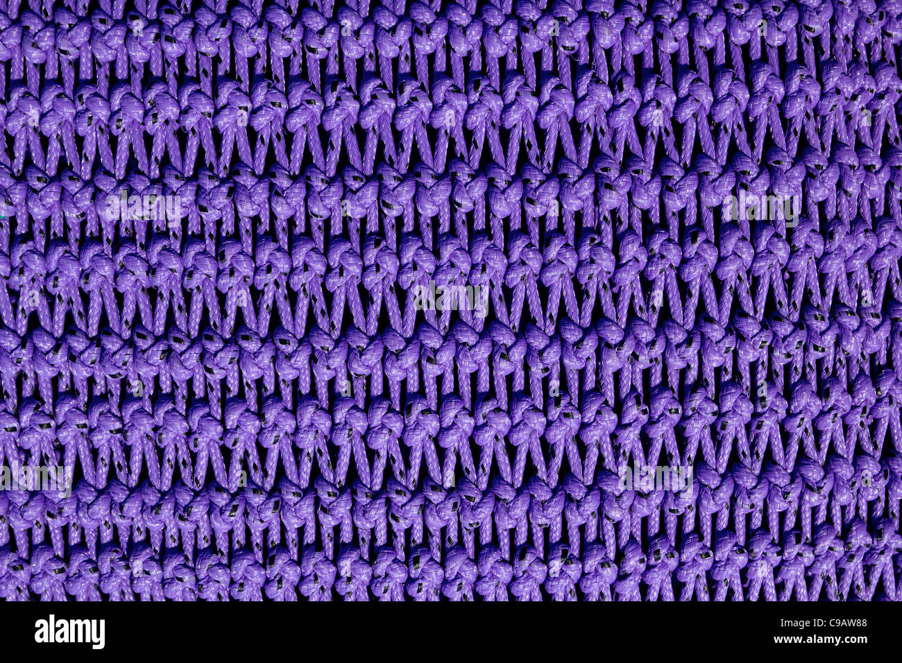 fishing trawler boat net purple texture with rope knots Stock Photo - Alamy