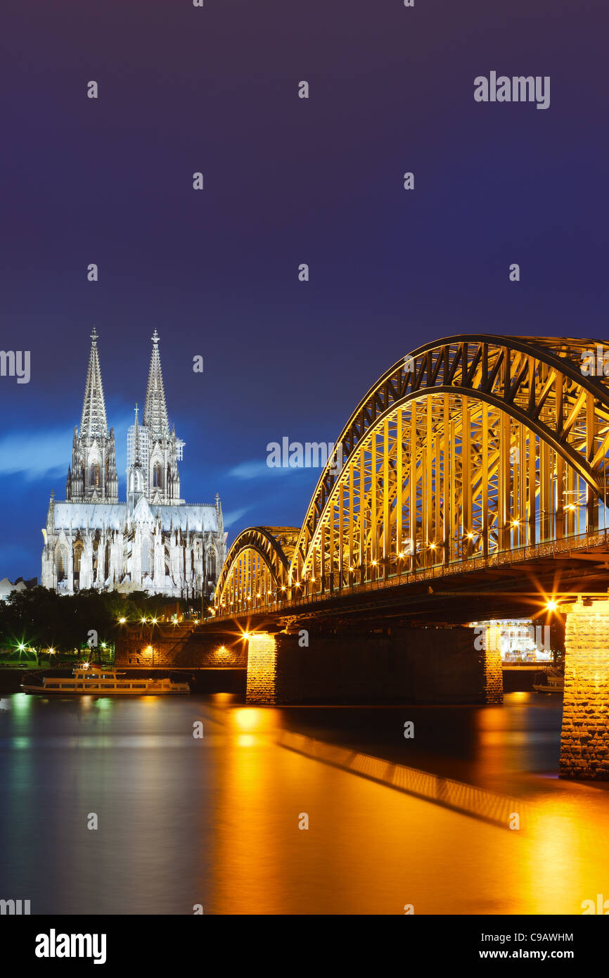 Cologne Cathedral & Hohenzollern Bridge after sunset Stock Photo - Alamy