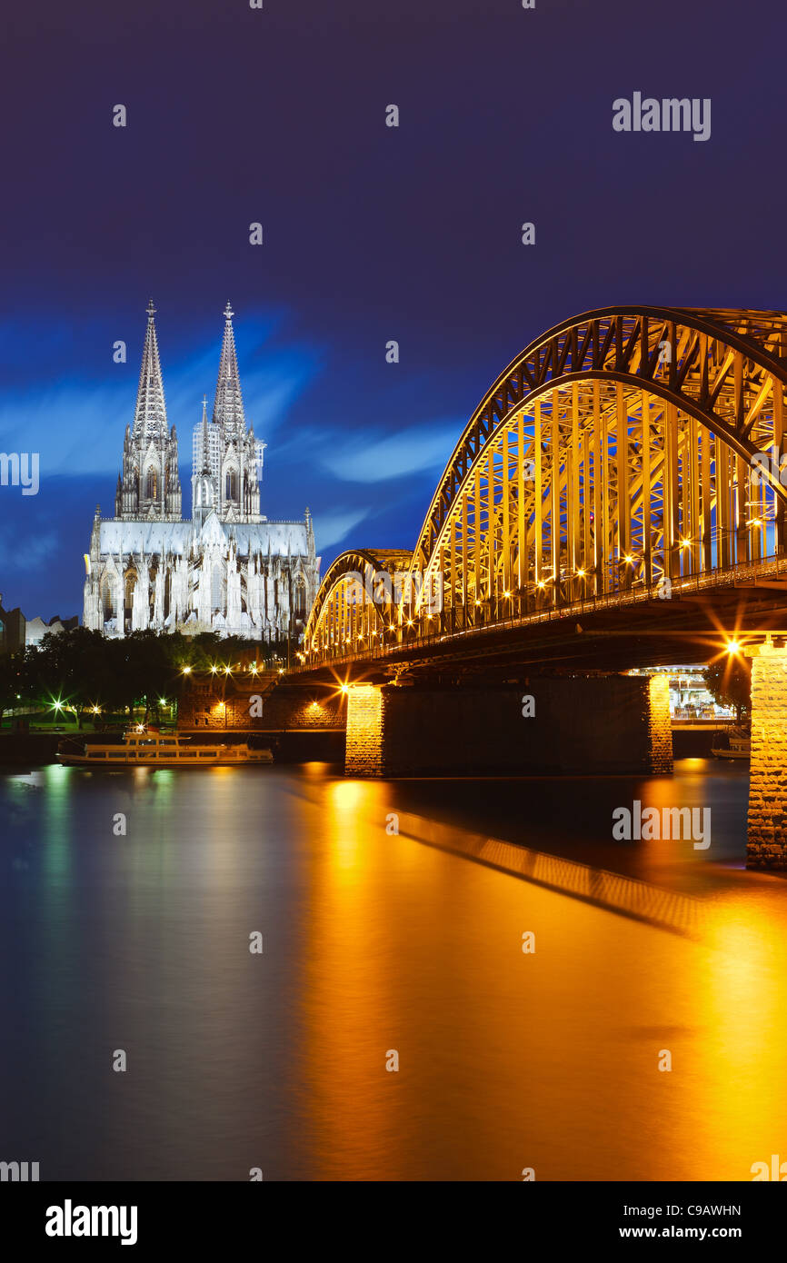 Cologne Cathedral & Hohenzollern Bridge after sunset Stock Photo - Alamy