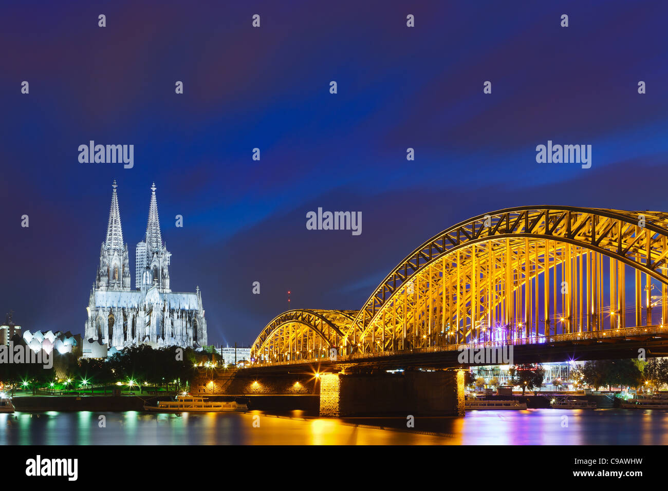 Cologne Cathedral & Hohenzollern Bridge after sunset Stock Photo - Alamy