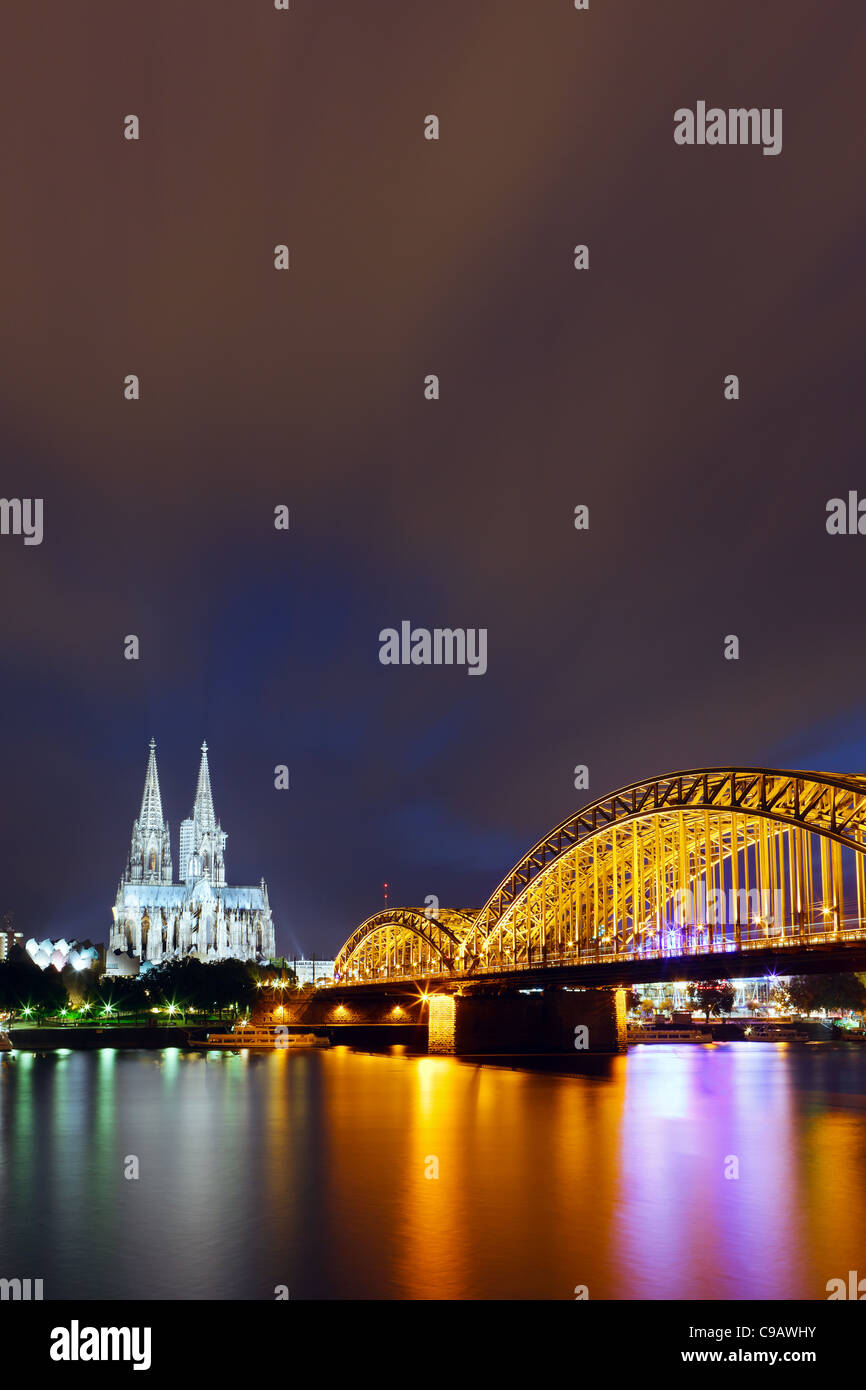 Cologne Cathedral & Hohenzollern Bridge after sunset Stock Photo - Alamy