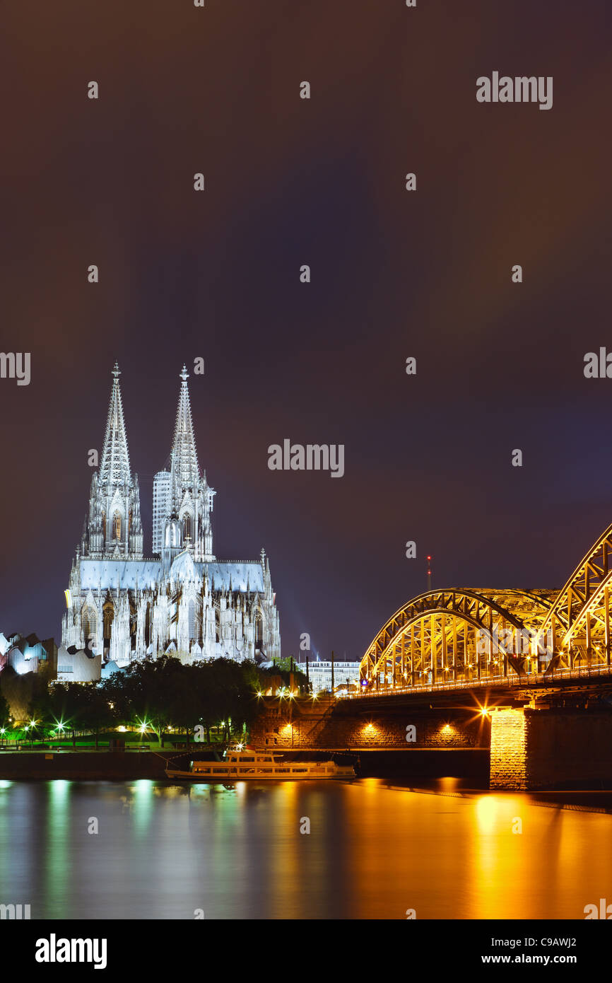Cologne Cathedral & Hohenzollern Bridge after sunset Stock Photo - Alamy