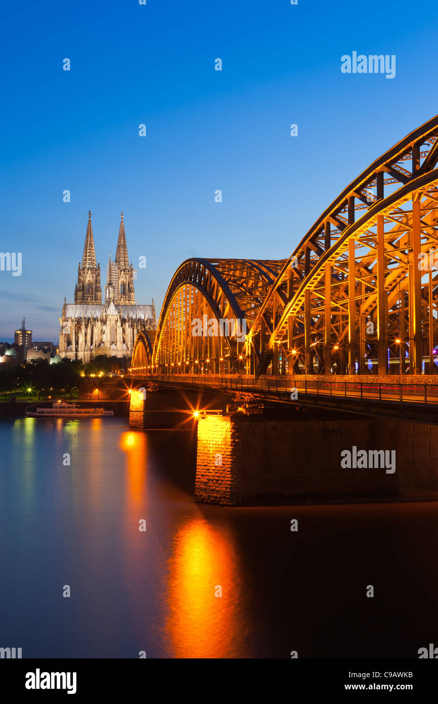 Cologne Cathedral & Hohenzollern Bridge after sunset Stock Photo - Alamy
