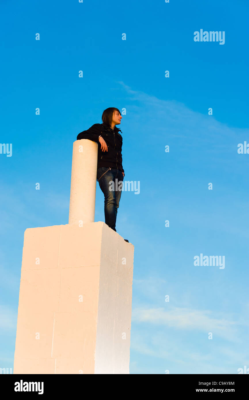 Teenager high up to see what future is to bring Stock Photo - Alamy