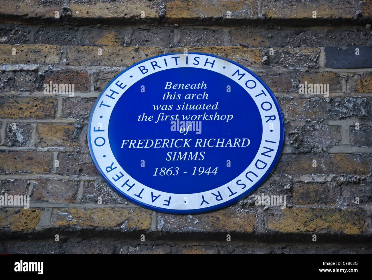 blue plaque on a railway arch of putney bridge, fulham, southwest ...