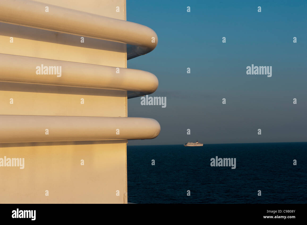 Exterior view of a passing cruise ship from the deck of the Cruise ship ...