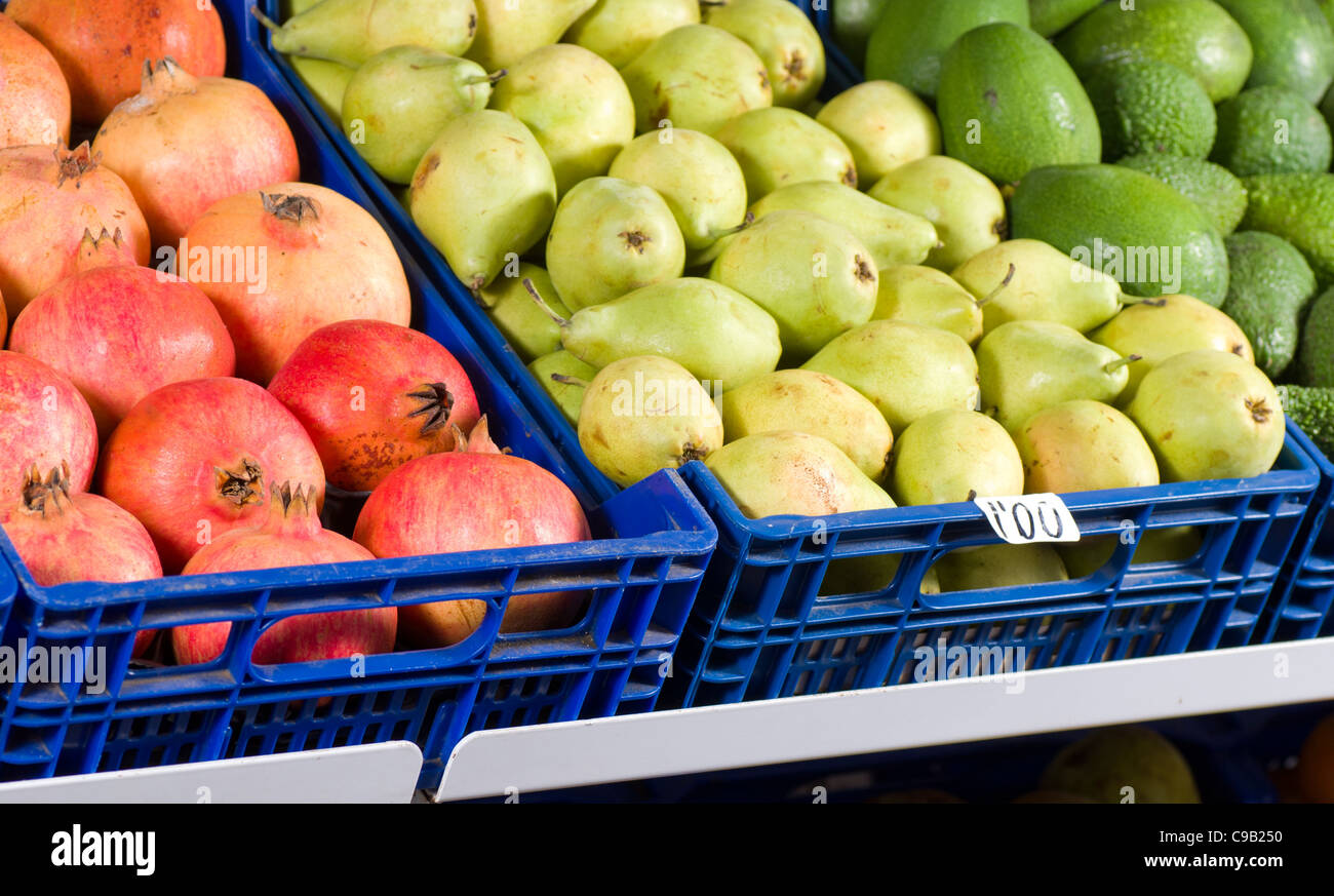 Fresh pomegranates on display market hi-res stock photography and ...