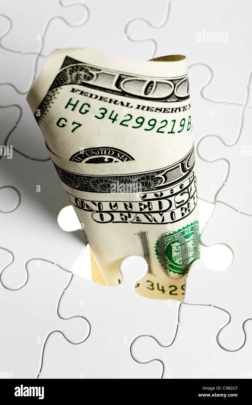Dollar puzzle hi-res stock photography and images - Alamy