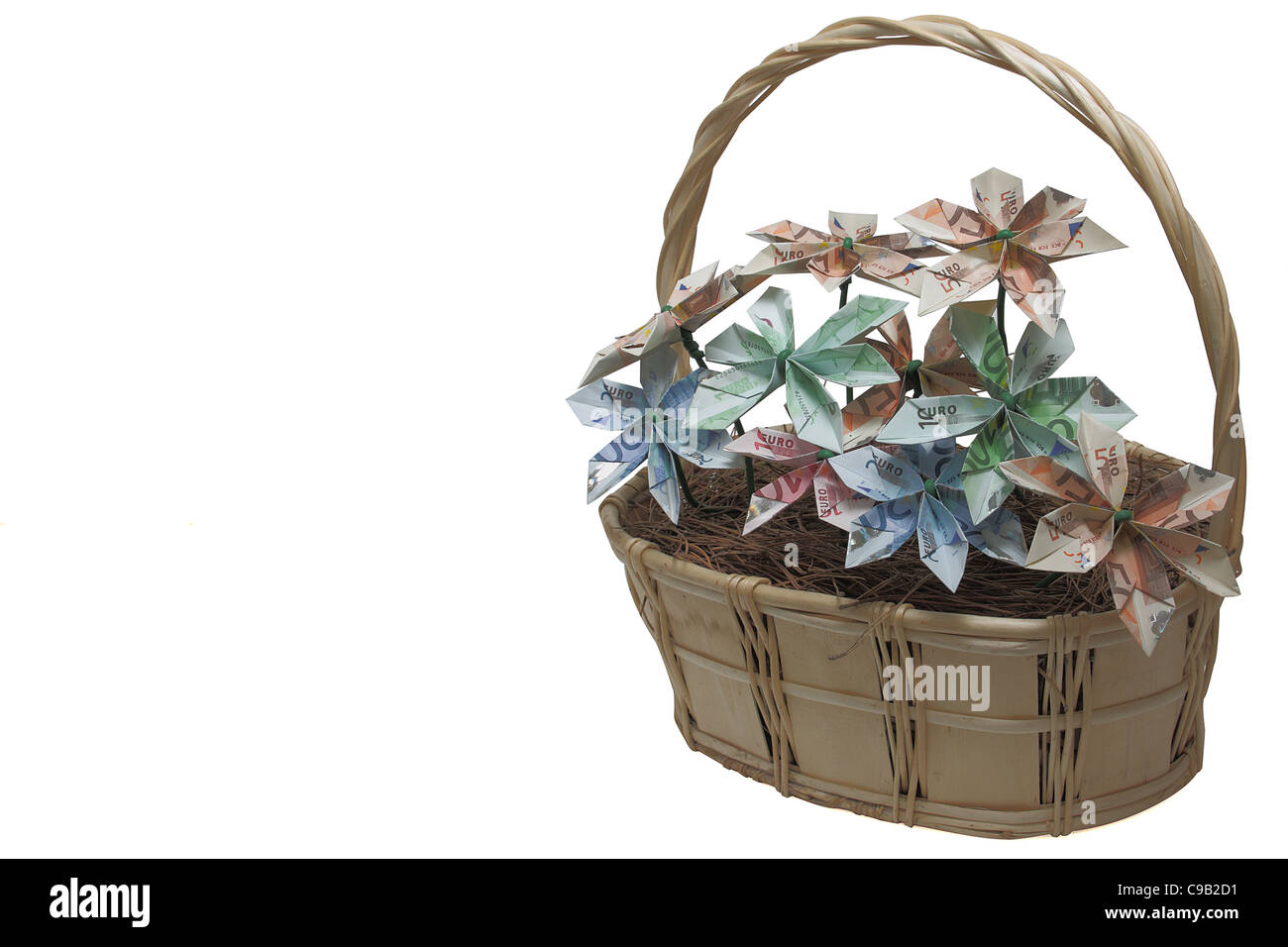 Bouquet of flowers origami made by bills of different values of euro ...