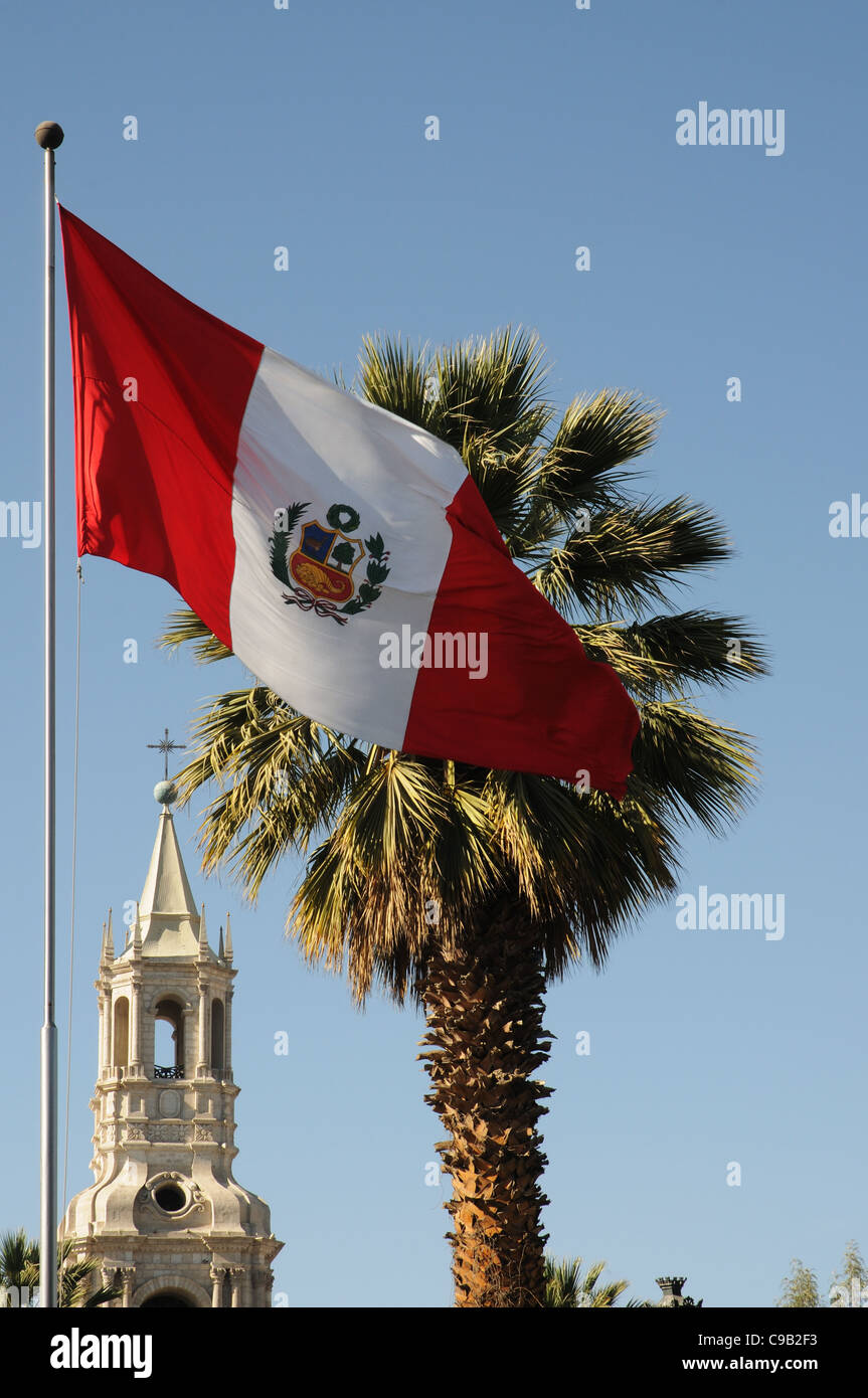 The Peruvian flag flying and the Cathedral at Arequipa Stock Photo - Alamy