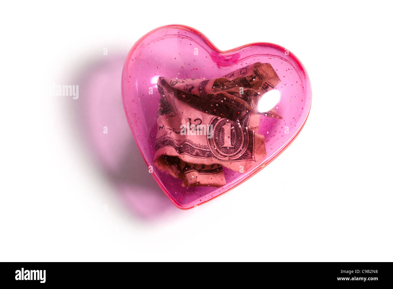 Heart dollar hi-res stock photography and images - Alamy