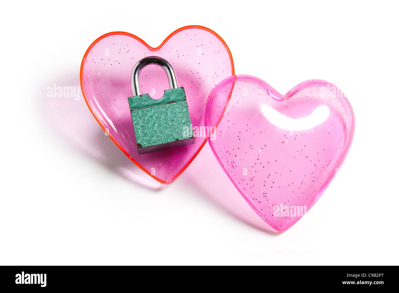 Pink heart and lock, love concept Stock Photo - Alamy
