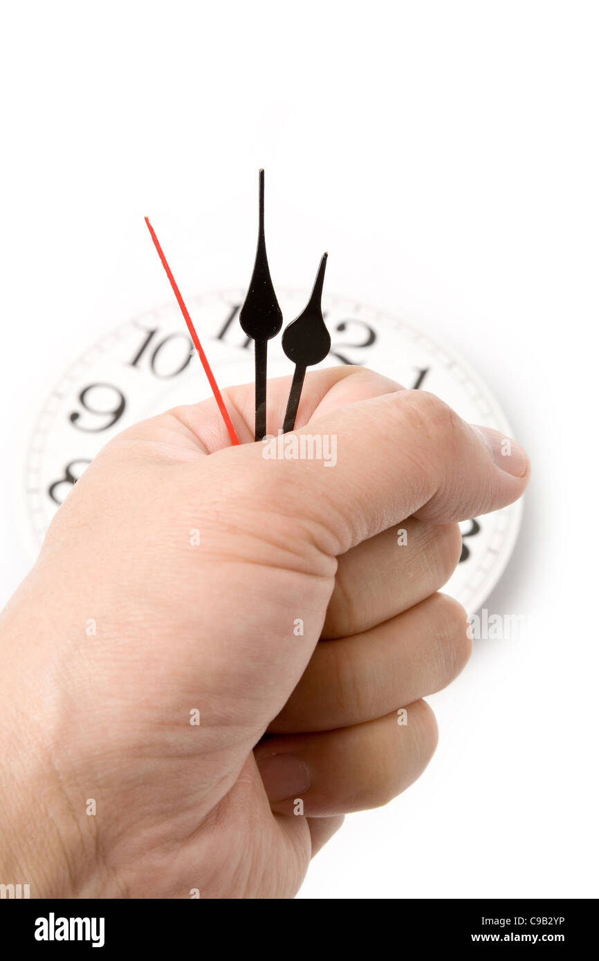 holding clock hands, concept of time control Stock Photo - Alamy