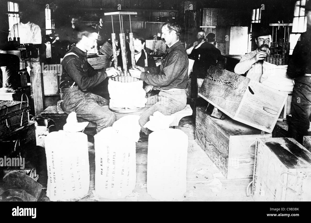 Men loading cartridges for big guns Stock Photo - Alamy