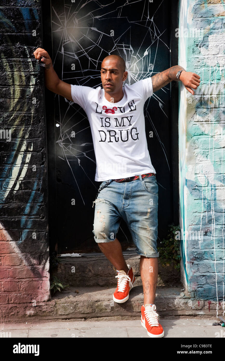 Young mixed race british man tattoos hi-res stock photography and ...