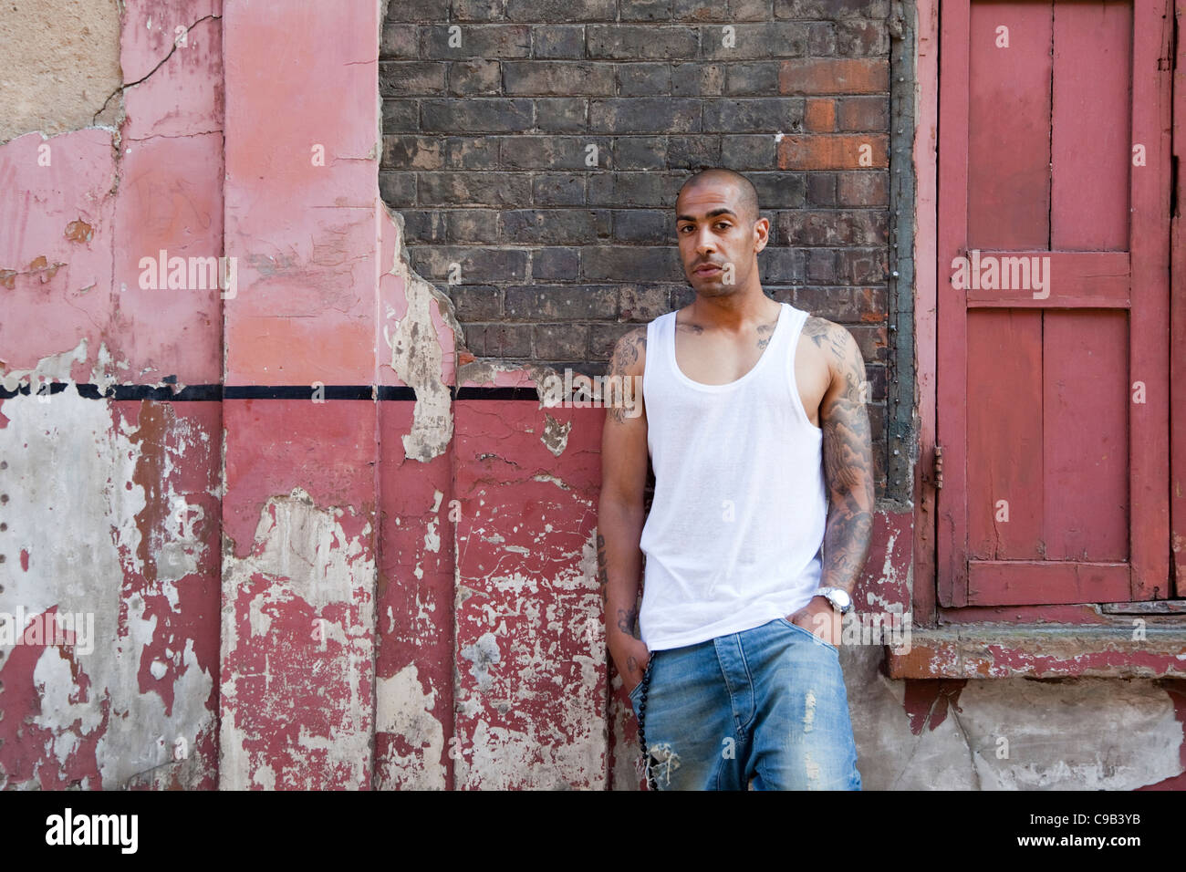 Young mixed race british man tattoos hi-res stock photography and ...