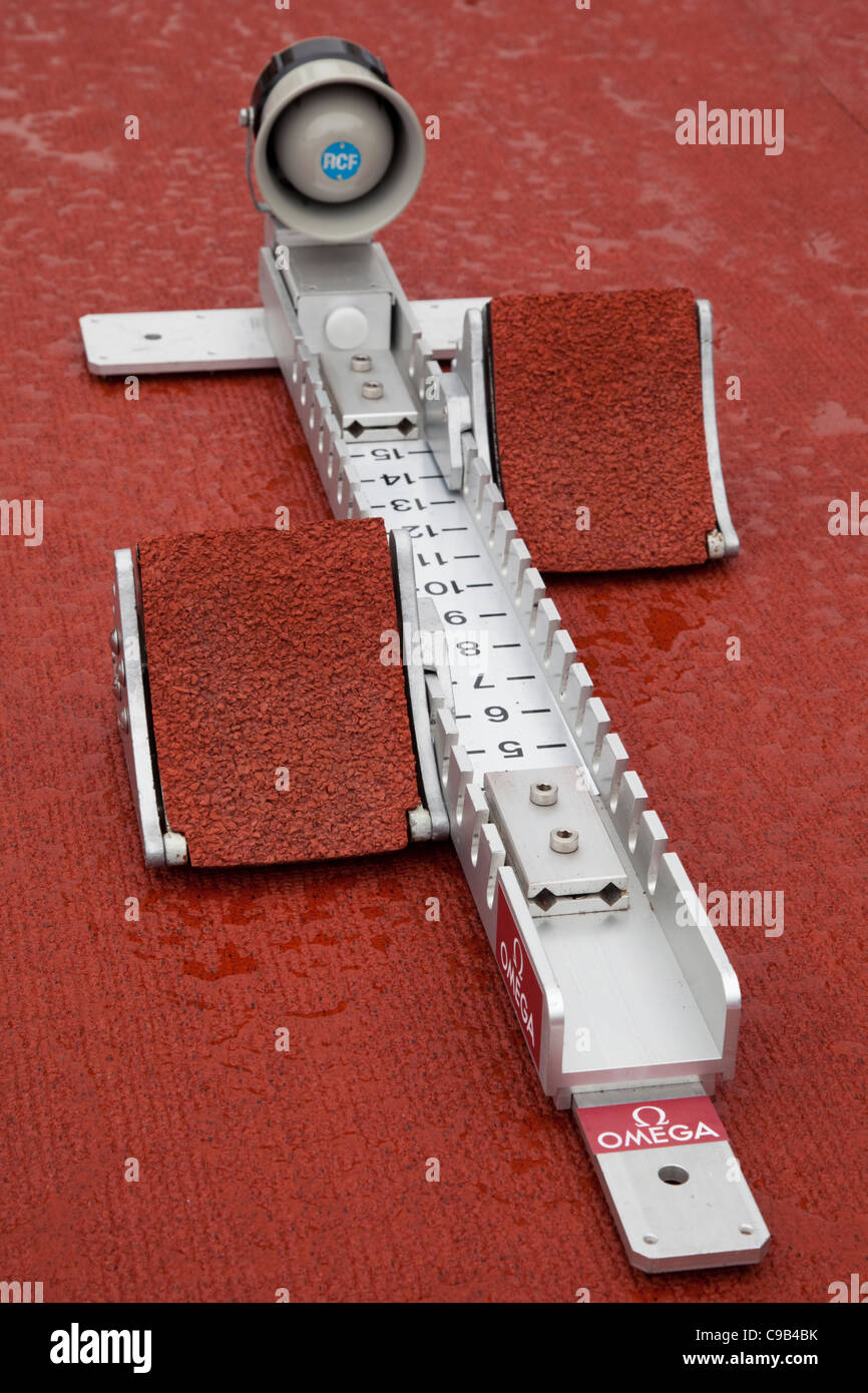 Starting blocks for runners with Omega timekeeping Stock Photo - Alamy